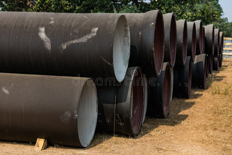 Side View of Ductile Iron Pipes Stored in Open Space Store Yard. Stock ...