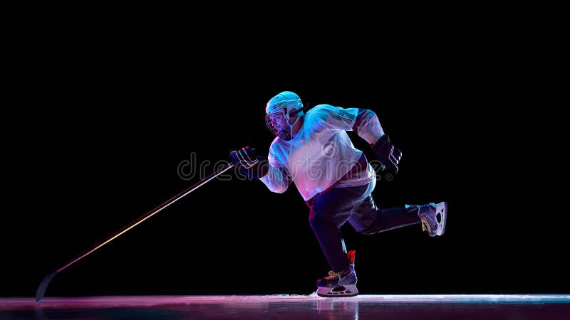 Side View Dynamic Image of Man, Hockey Player in Motion with Stick ...