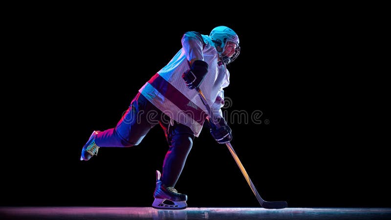 Side View Dynamic Image of Man, Hockey Player in Motion with Stick ...