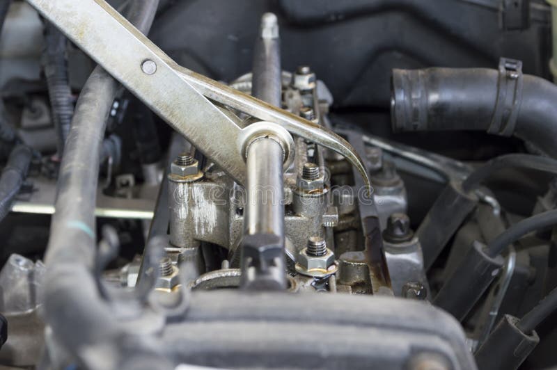 Side View of the Engine with a Special Tool Installed To Adjust the ...