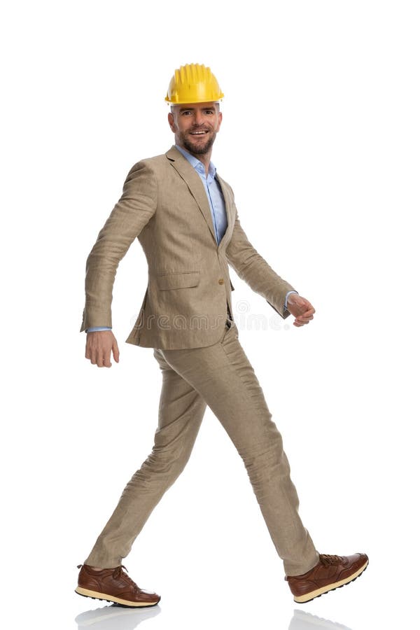 Side View of Engineer Man with Hat Walking and Smiling Stock Image ...