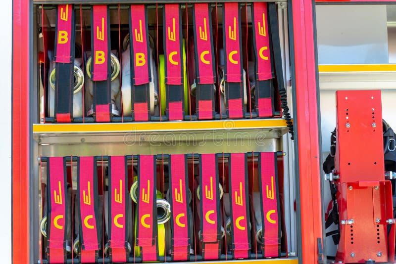 The Side View of Equipment Packed Neatly Inside a Fire Engine Stock ...