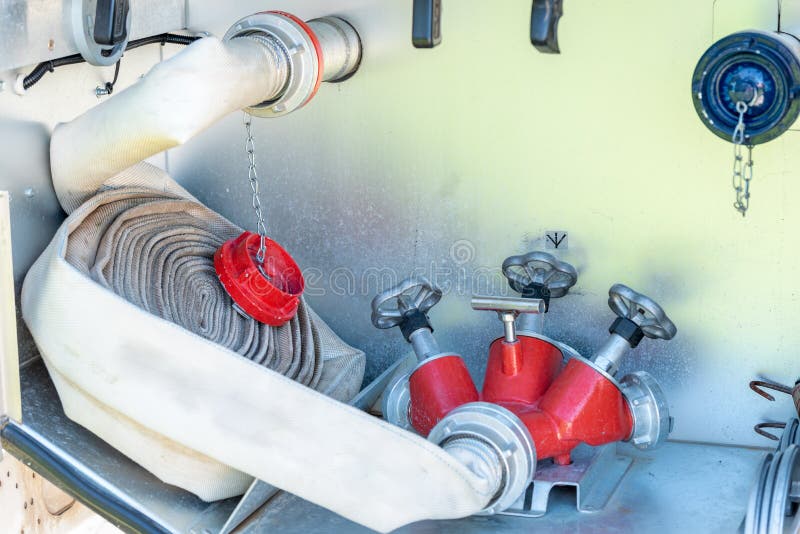 Equipment Packed Neatly Inside a Fire Truck with Sunlight. Stock Photo ...