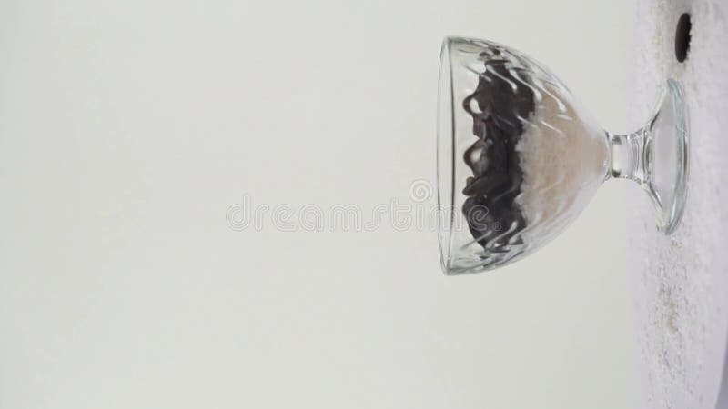 Dropping Chocolate Tablets on a Plate with Shredded Coconut Stock Video ...