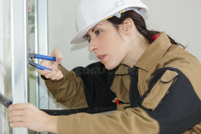 Side View Female Construction Worker Stock Image - Image of protective ...