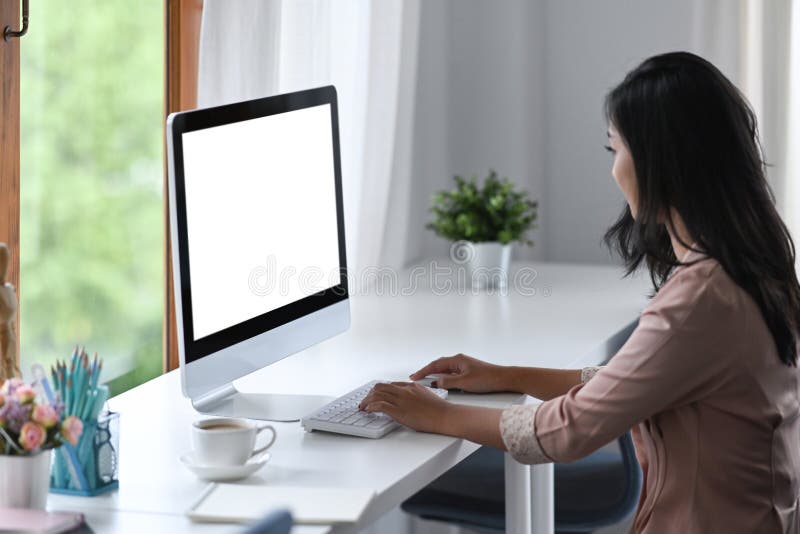 Side View Female Entrepreneur Using Computer at Office Desk. Stock ...