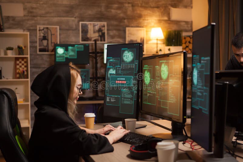 Side View of Female Hacker Writing a Dangerous Malware Stock Image ...