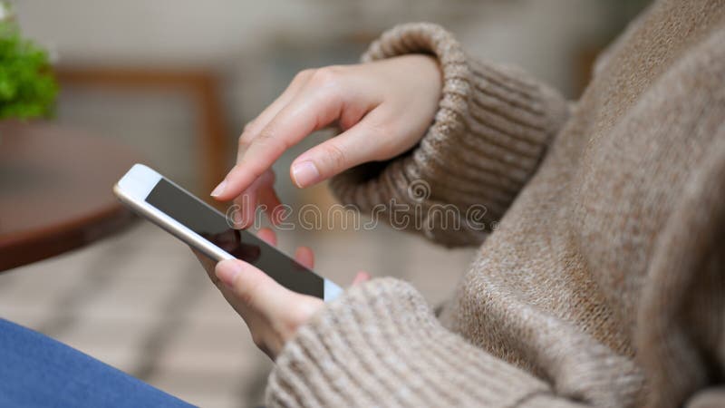 Side View, Female Sitting and Relaxing at the Park, Using Smartphone ...