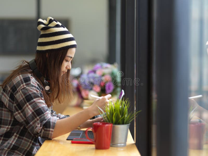 Female Student Doing Homework with Digital Tablet on Bar in Cafe Stock ...
