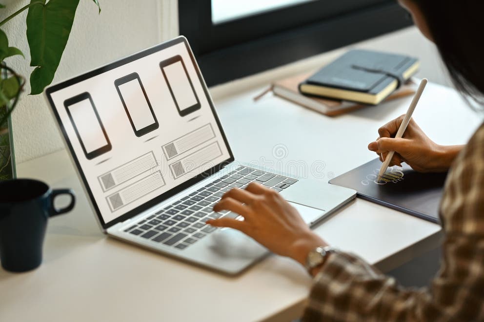 Side View of Female Website Developer Planning Application Development ...