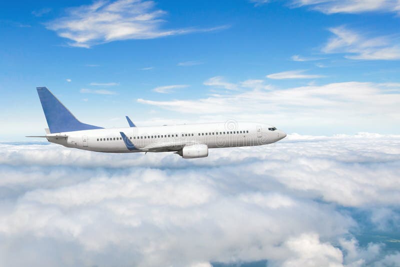 Passenger Jet Plane in the Blue Sky. Aircraft Flying High through the ...