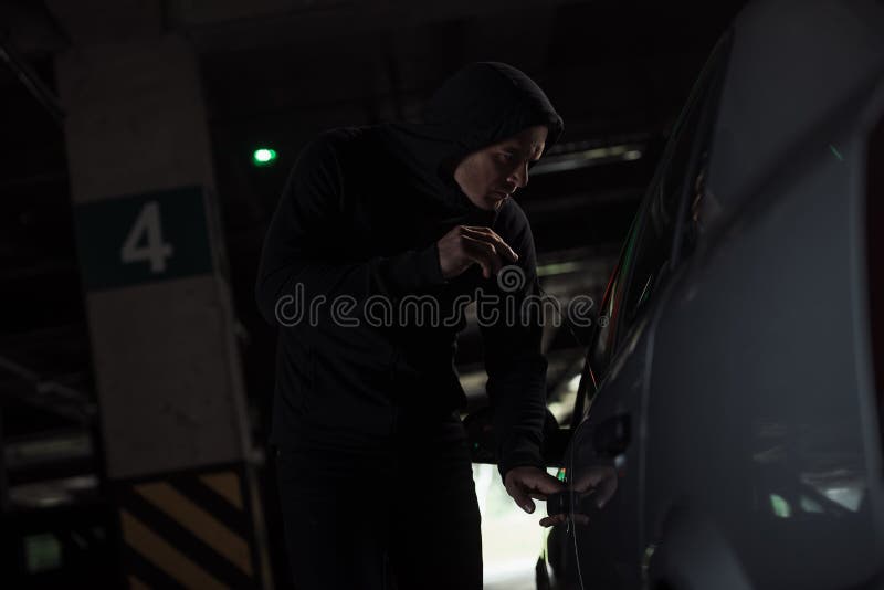 Side View of Focused Male Thief Intruding Car Stock Photo - Image of ...