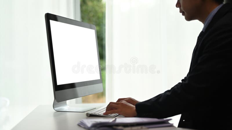 Side View of a Freelance Graphic Designer Man is Working on Computer at ...