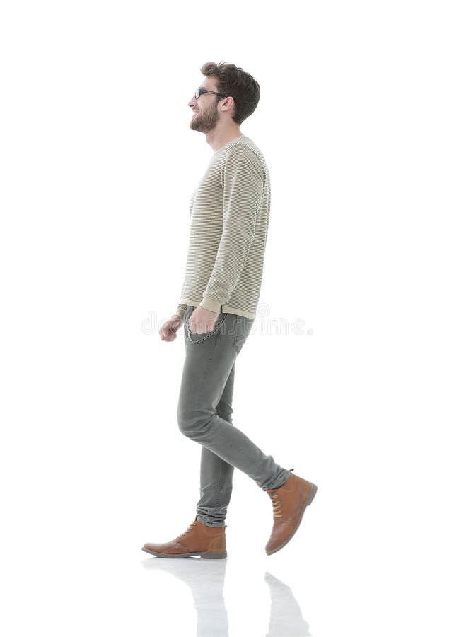 Side View.Young Smiling Man Walking Forward Stock Image - Image of ...