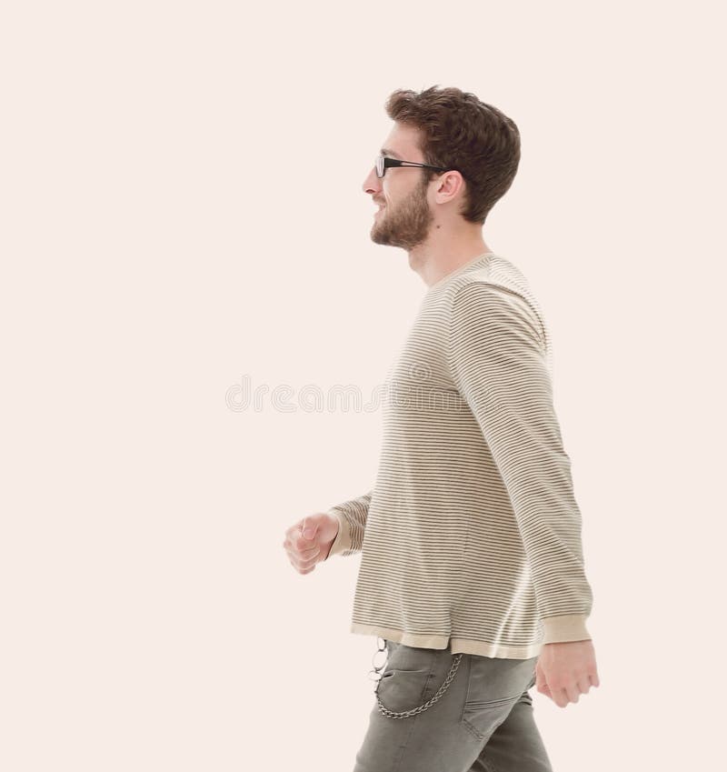 Side View.Young Smiling Man Walking Forward Stock Image - Image of ...