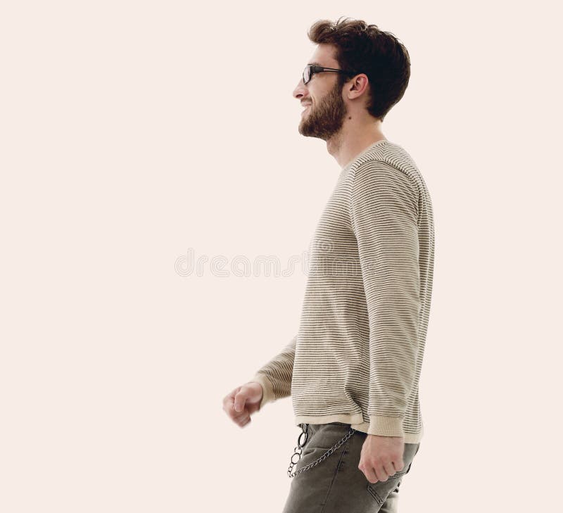 Side View.Young Smiling Man Walking Forward Stock Photo - Image of ...