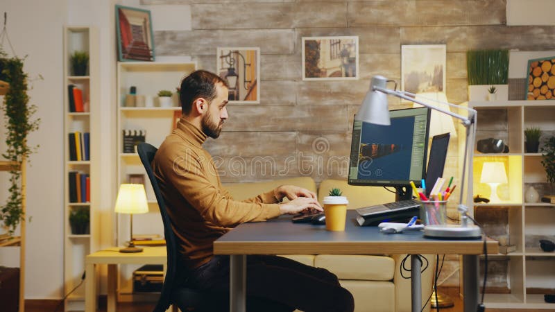 Side View of Game Developer Working from Home Office Stock Image ...