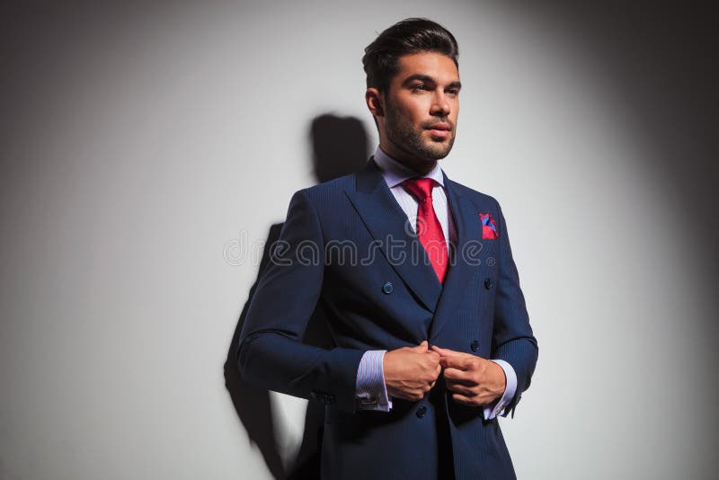Side View of a Gentleman Buttoning His Suit Stock Photo - Image of blue ...