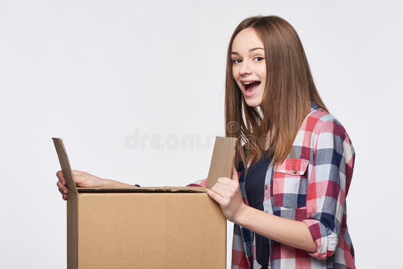 Side View a Girl Opening a Box Stock Photo - Image of package, gift ...