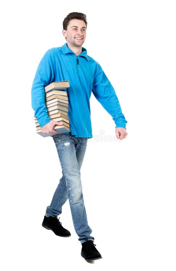 Side View of Going Man Carries a Stack of Books. Stock Photo - Image of ...
