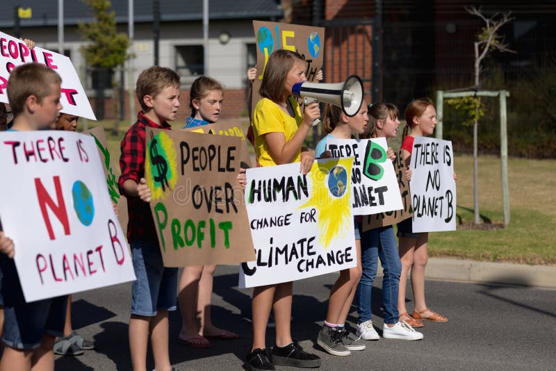 Group of Elementary School Pupils Walking on a Protest March Stock ...