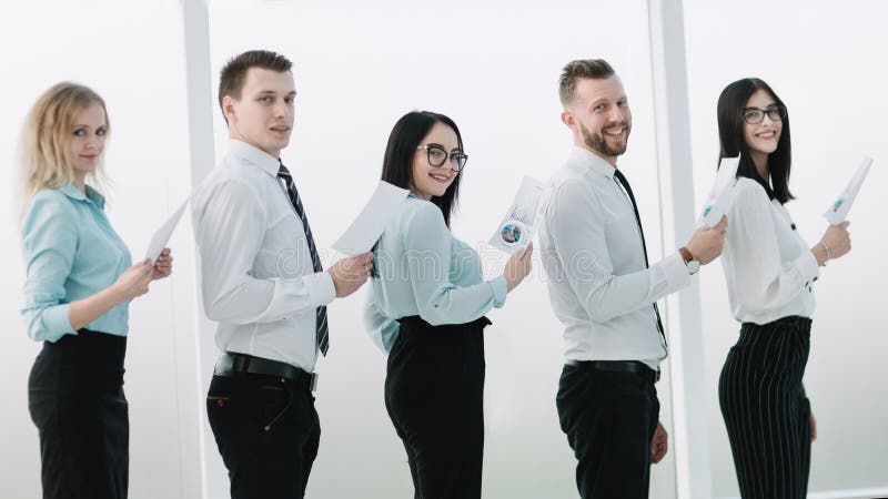 Side View. Group of Employees with Standing in Line Stock Photo - Image ...