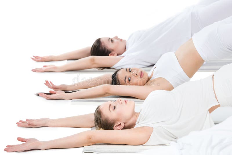 Side View of Group of Young Women Doing Yoga Position Stock Image ...