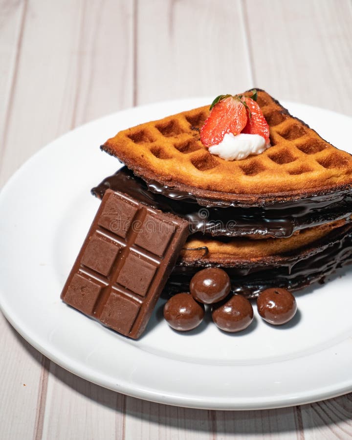 Side View of Half Waffles with Chocolate in the Inside and Strawberries ...