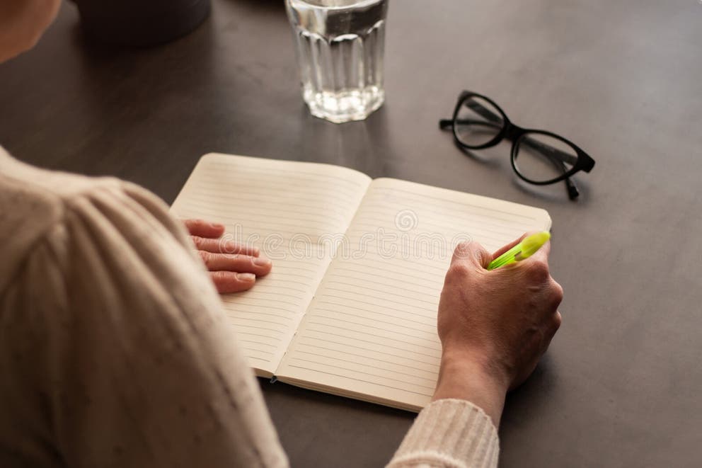 Side View of Hand Writing Notes with Pen in Plain Notebook. Minimalist ...