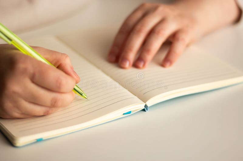 Side View of Hand Writing Notes with Pen in Plain Notebook. Minimalist ...