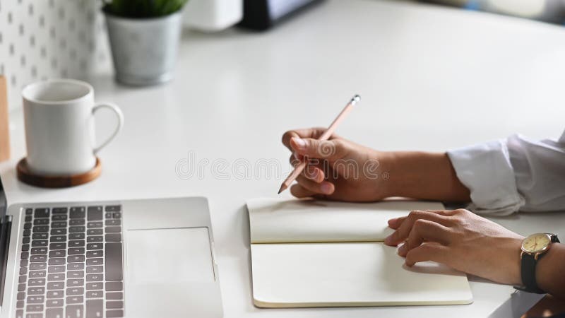 Side View Hands Writing on Notebook Paper, Cropped Shot Female Working ...