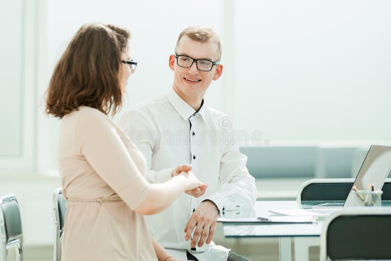 Side View.handshake Manager and Client at the Office Desk Stock Image ...