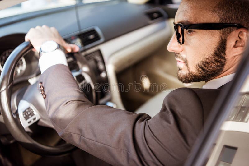 Side View of Handsome Driver in Suit and Glasses Stock Photo - Image of ...