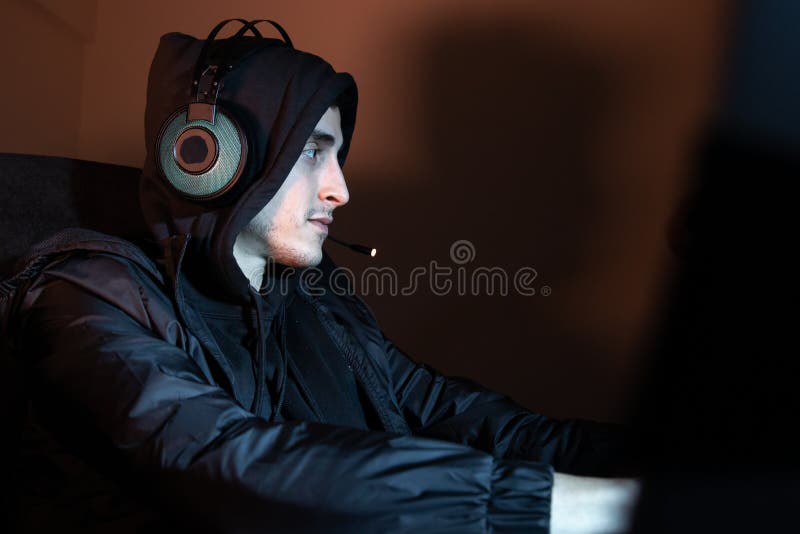 Side View of Handsome Hacker at Work Stock Photo - Image of crime, dark ...