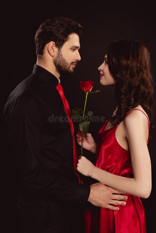 Side View of Handsome Man Hugging Elegance Girlfriend with Rose Stock ...