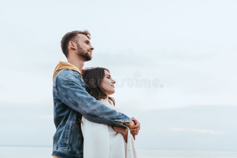 Side View of Happy Man Hugging Stock Photo - Image of relationship ...