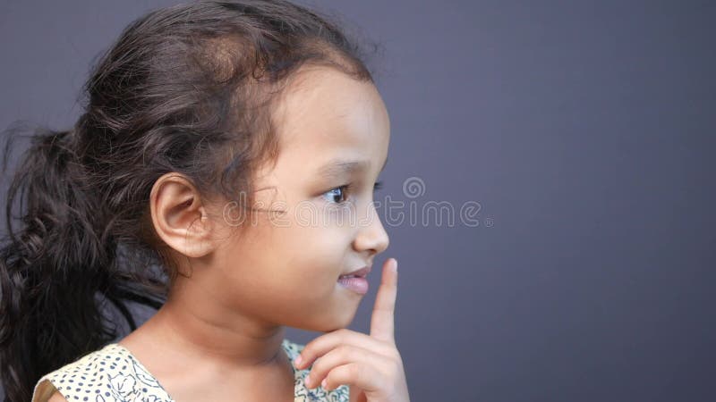 Side View of Child Girl Scratching Head Indoor Stock Video - Video of ...