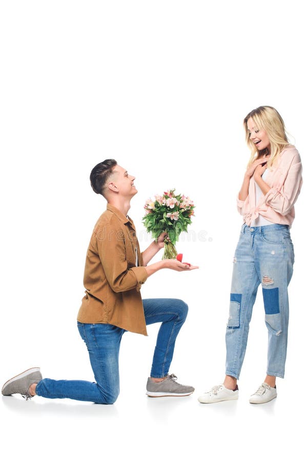 Side View of Happy Young Man Making Proposal To Girlfriend Stock Photo ...