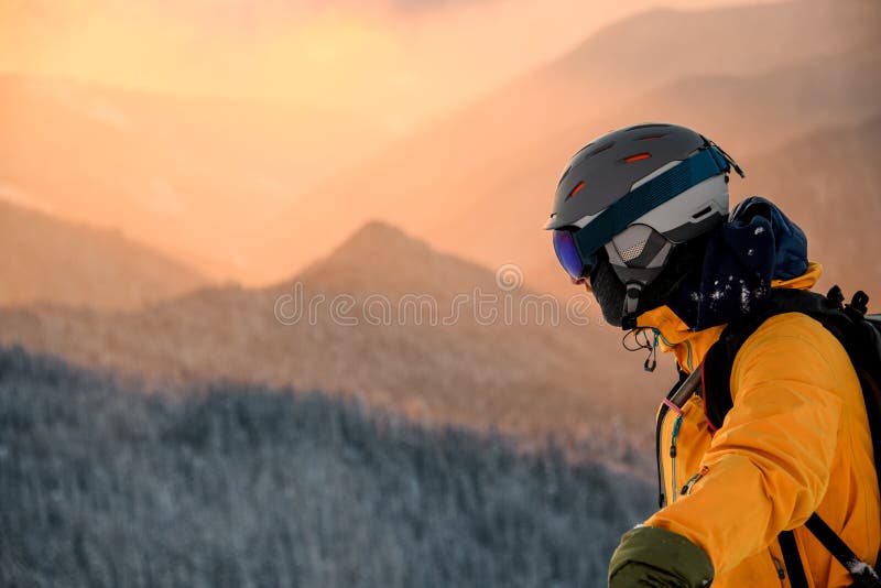 Side View of the Head of Ski Athlete Against the Backdrop of Mountains ...
