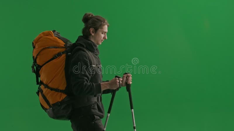 Side View of a Hiker with a Trekking Sticks Close Up. a Man with a ...