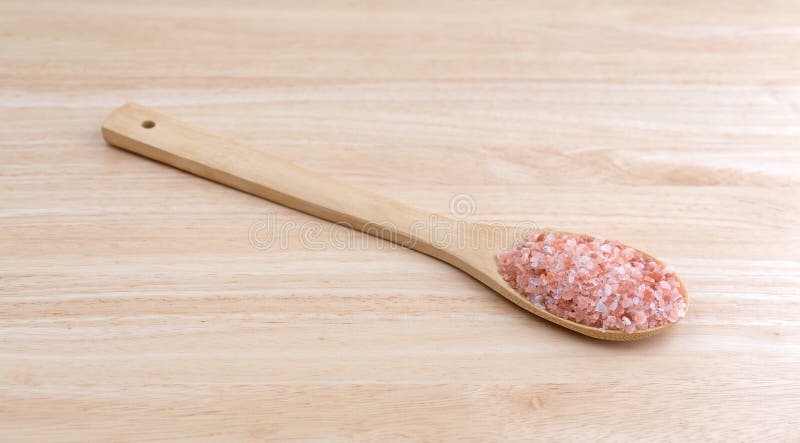 Side View of Himalayan Pink Salt on a Wood Spoon Stock Photo - Image of ...