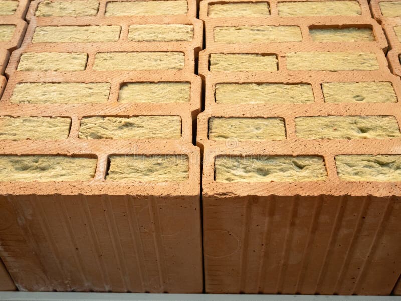 Side View on Hollow Red Bricks with Mineral Wool for Insulation Stock ...