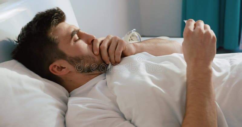 Side View at the Ill Man Checking His Body Temperature Using the ...