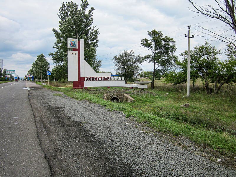 A Side View Image of a Red and White Structure on a Grassy Area ...