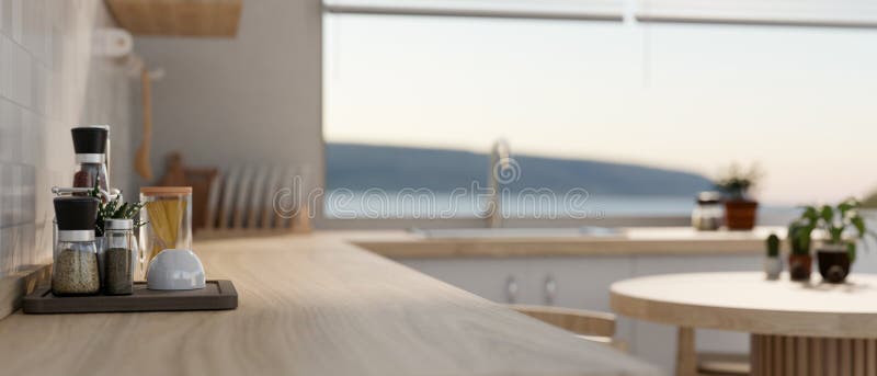 Side View Image of Spice Bottles on a Wooden Kitchen Countertop in a ...