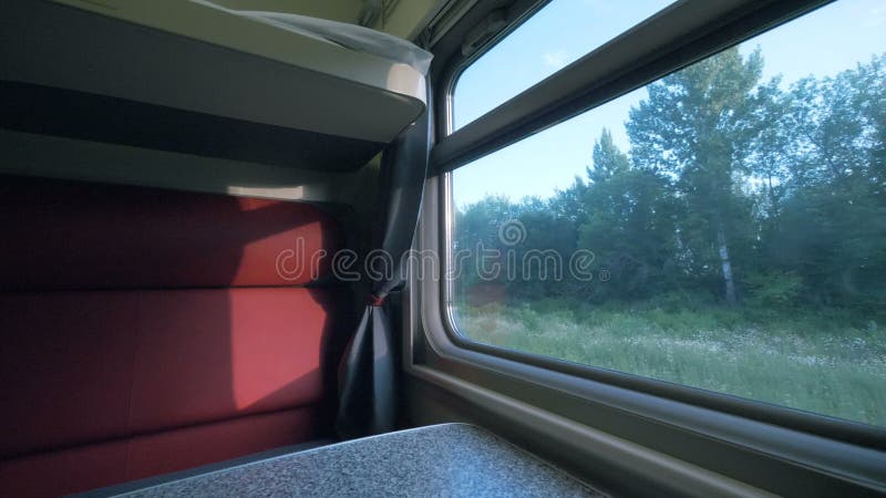 Side View of an Interior of a Coupe Coach in a Moving Train. Travelling ...