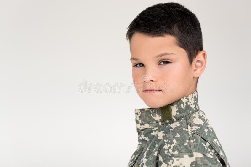 Side View of Kid in Military Uniform Looking at Camera Stock Photo ...