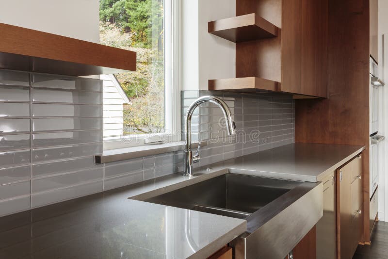 Side View of Kitchen and Sink Stock Photo - Image of subway, backsplash ...