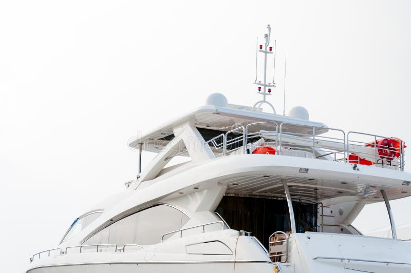 Rear of the Luxury Yacht with Dingy and BBQ Party Equipments Stock ...