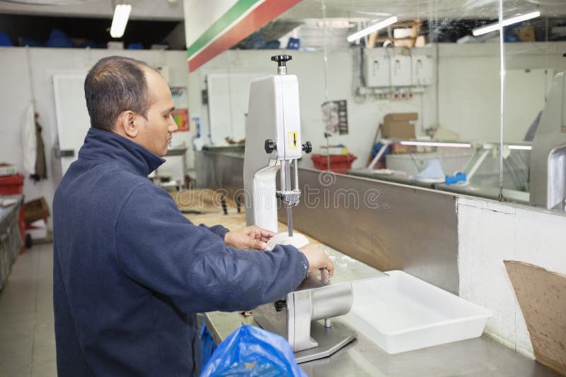 Side View of Male Employee Working in Supermarket Stock Image - Image ...